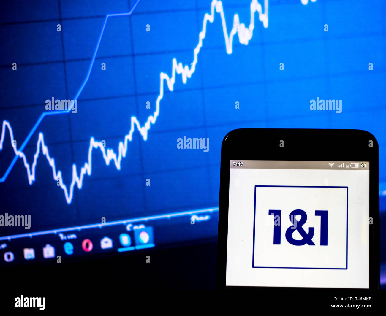 In this photo illustration a 1 & 1 Ionos logo seen displayed on a smart ...