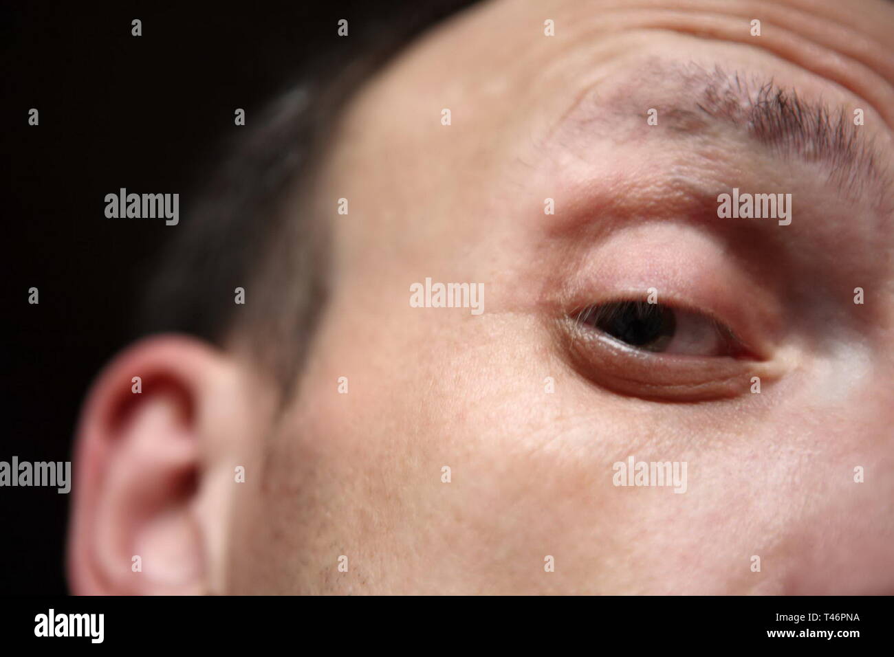 one eye of man close up Stock Photo - Alamy