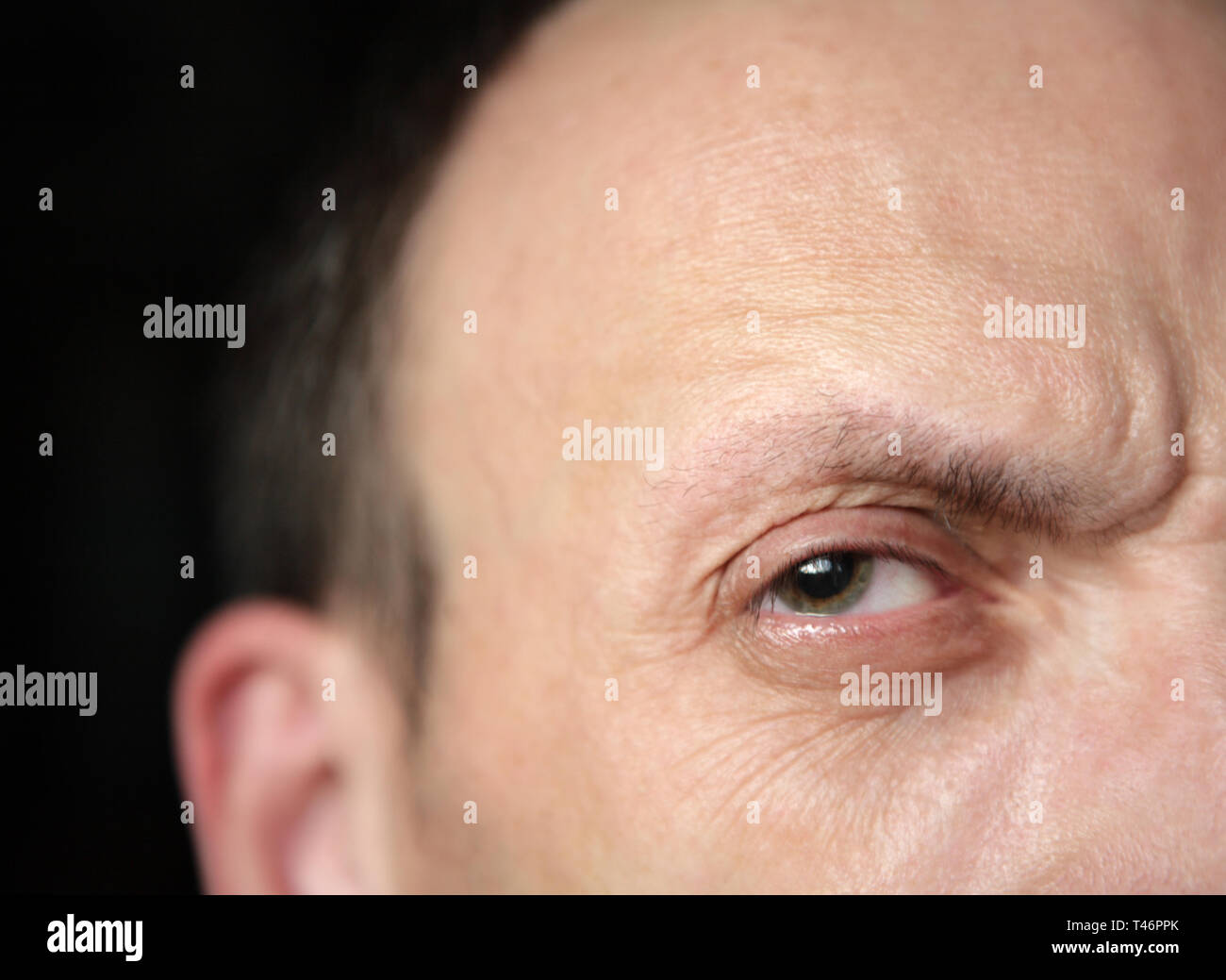 one eye of alone man Stock Photo - Alamy