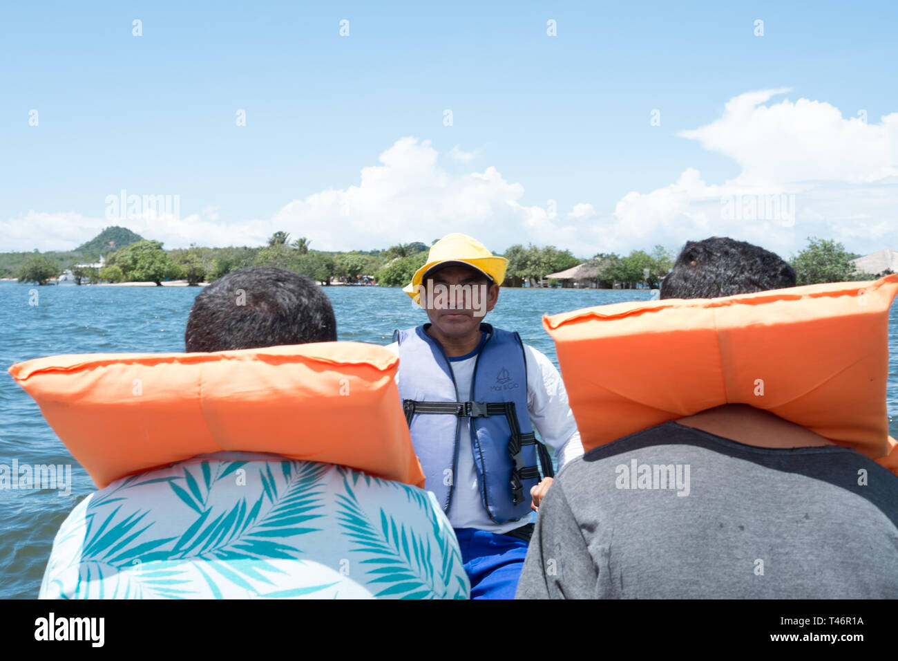 Amazon Boatman rowing Stock Photo - Alamy