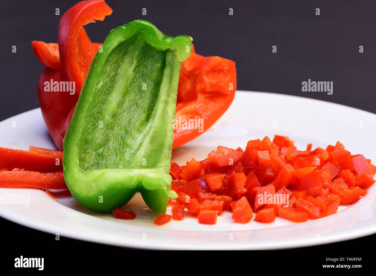 plate of bell peppers cut and diced Stock Photo - Alamy
