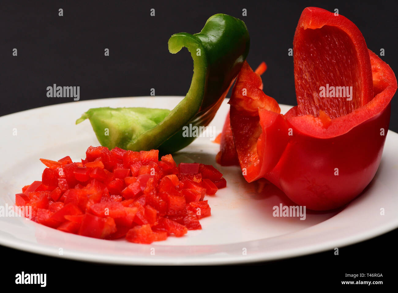 plate of bell peppers cut and diced Stock Photo - Alamy