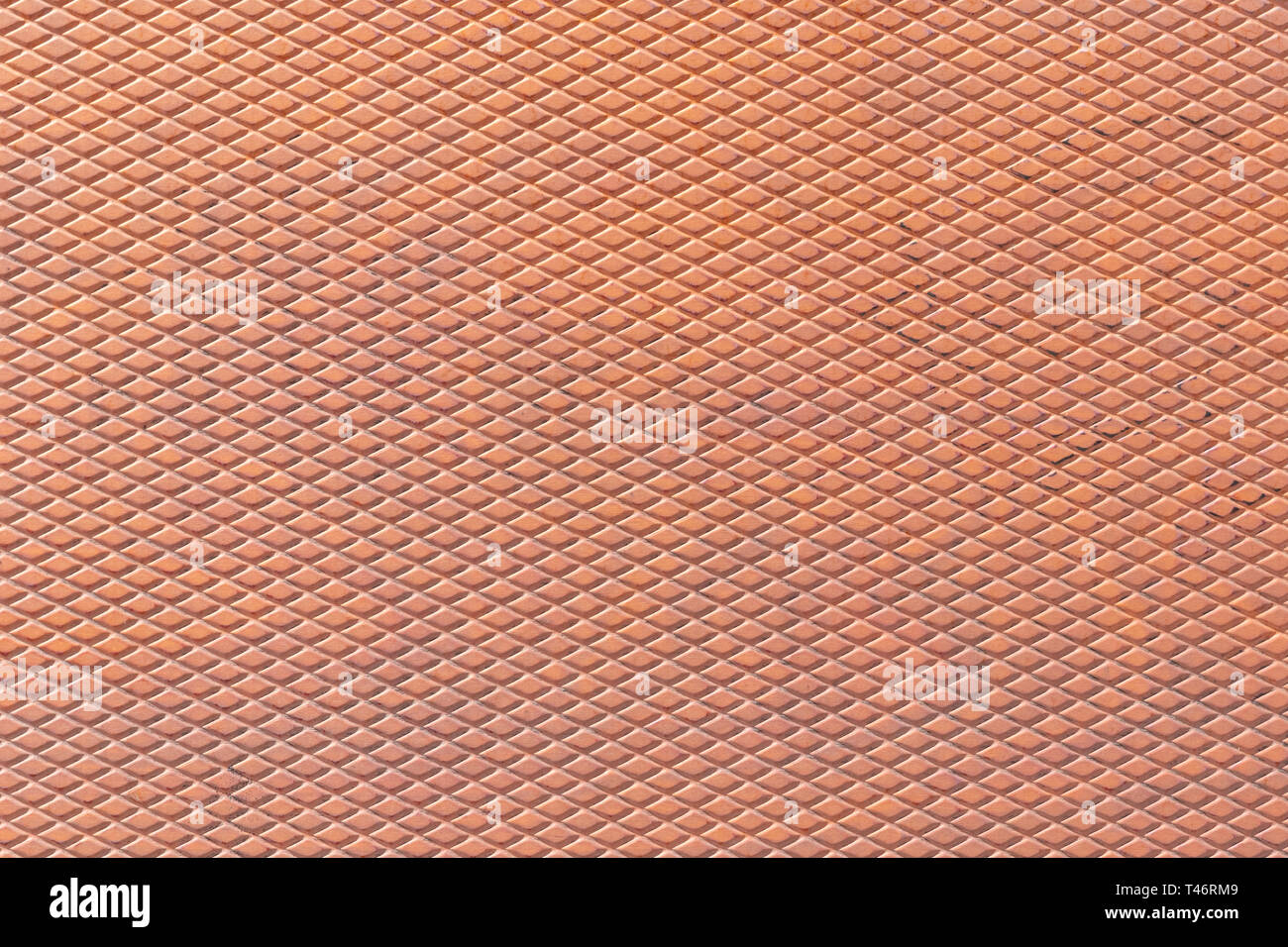 Corrugated steel sheetCorrugated steel sheet with rust. Rhombic pattern ...