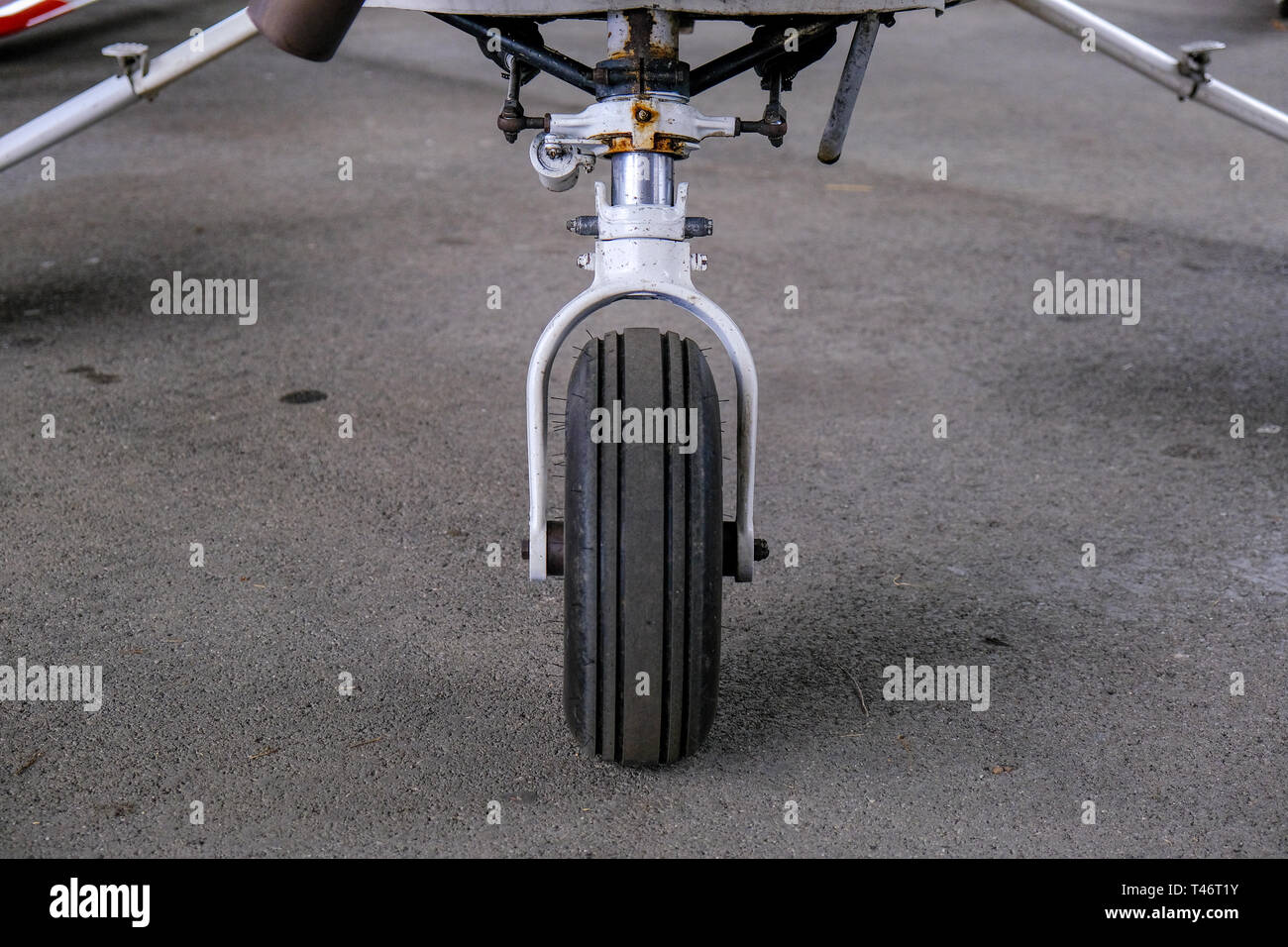Landing gear close up, light sport aicraft wheel, front view of damper ...
