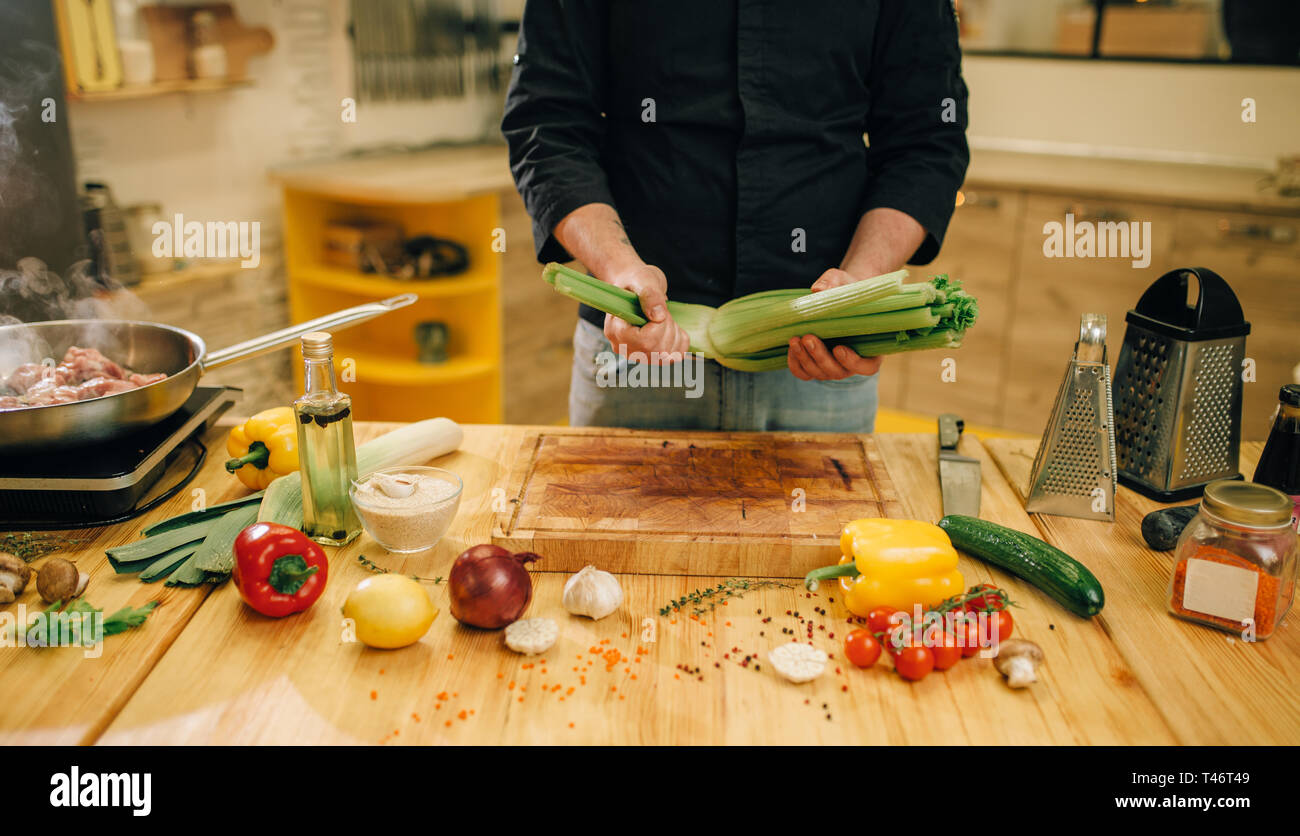 Person frying vegetables cooking hi-res stock photography and images ...