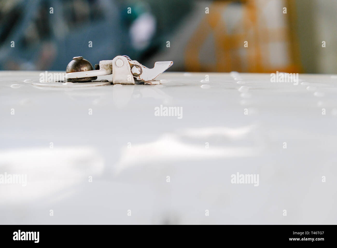 Detail of light sport aircraft fuselage, top engine cowling latch Stock ...