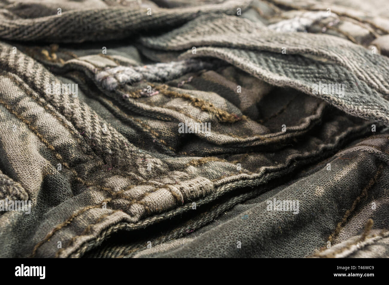 clothing items washed cotton fabric texture with seams, clasps, buttons ...