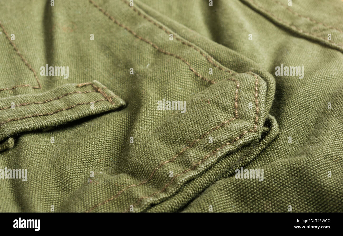 clothing items washed cotton fabric texture with seams, macro, close-up ...