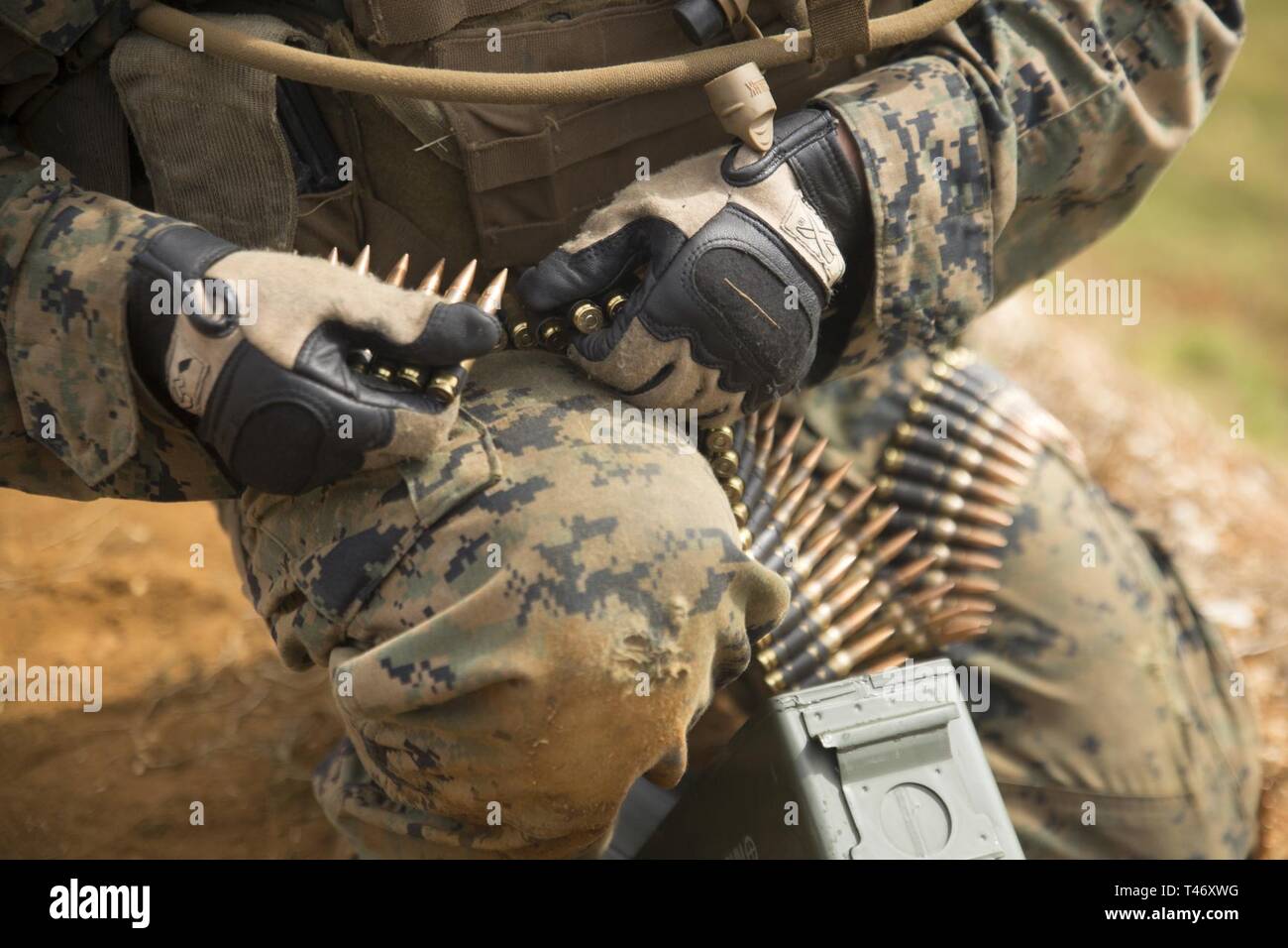 Lance Cpl. Jonathan Clutter, a machine gunner with Alpha Company ...