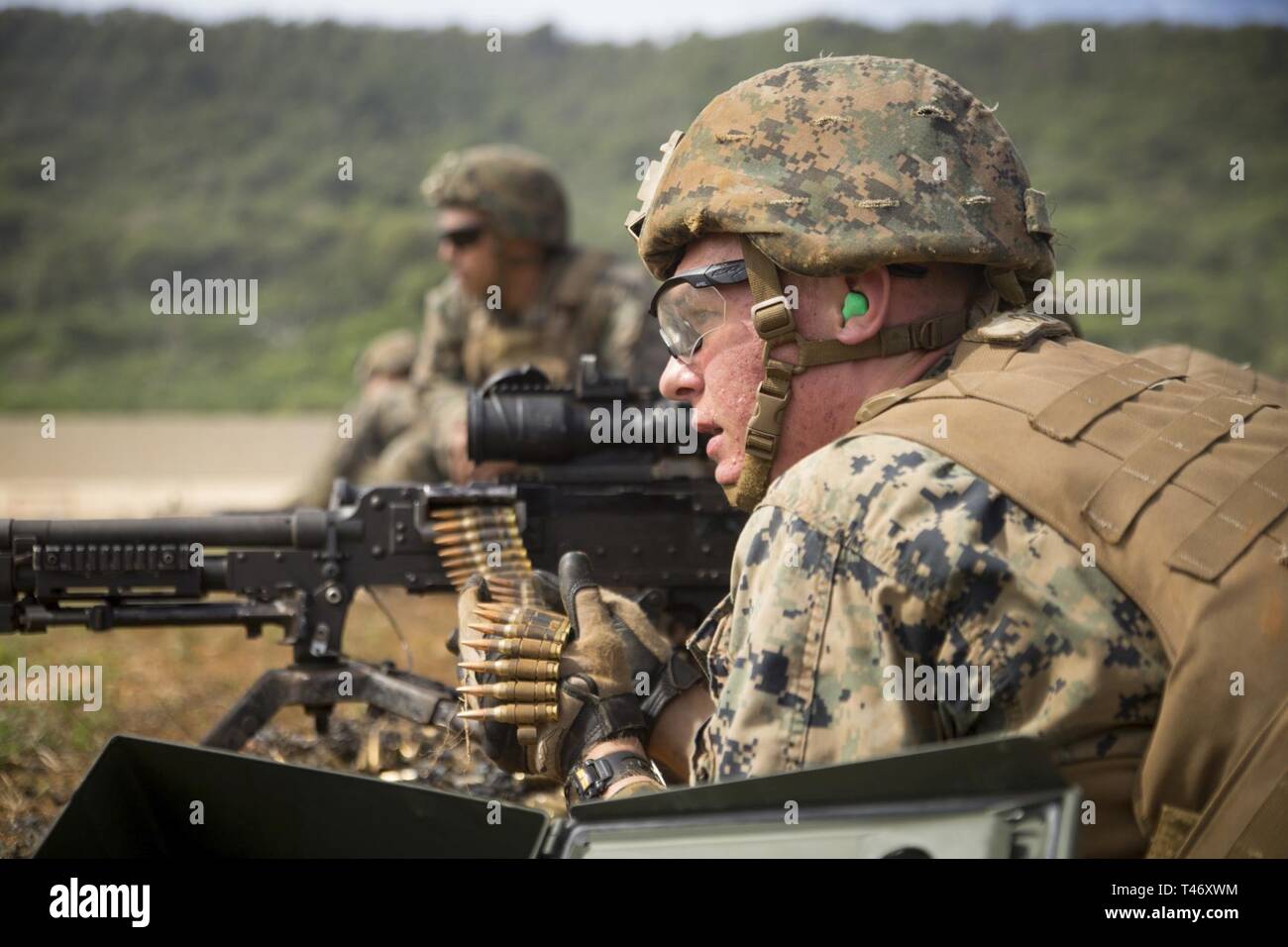 Lance Cpl. Jonathan Clutter, a machine gunner with Alpha Company ...
