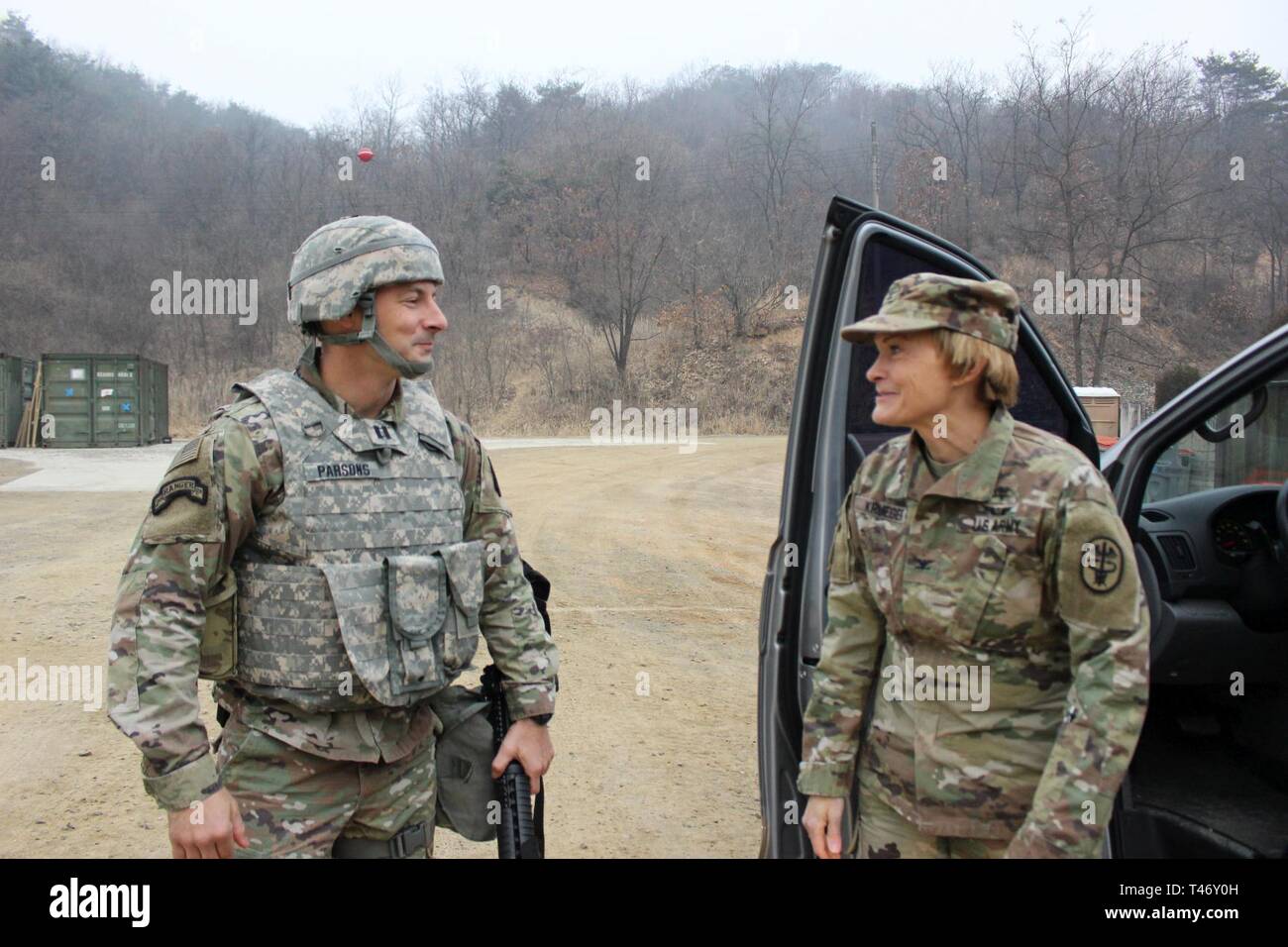 Capt. Jason A. Parsons (left), assigned to the 121st Combat Support ...