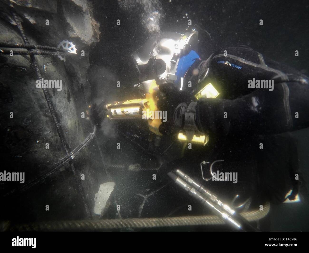 Hospital Corpsman 1st Class Ryan Kitchens, assigned to Underwater ...