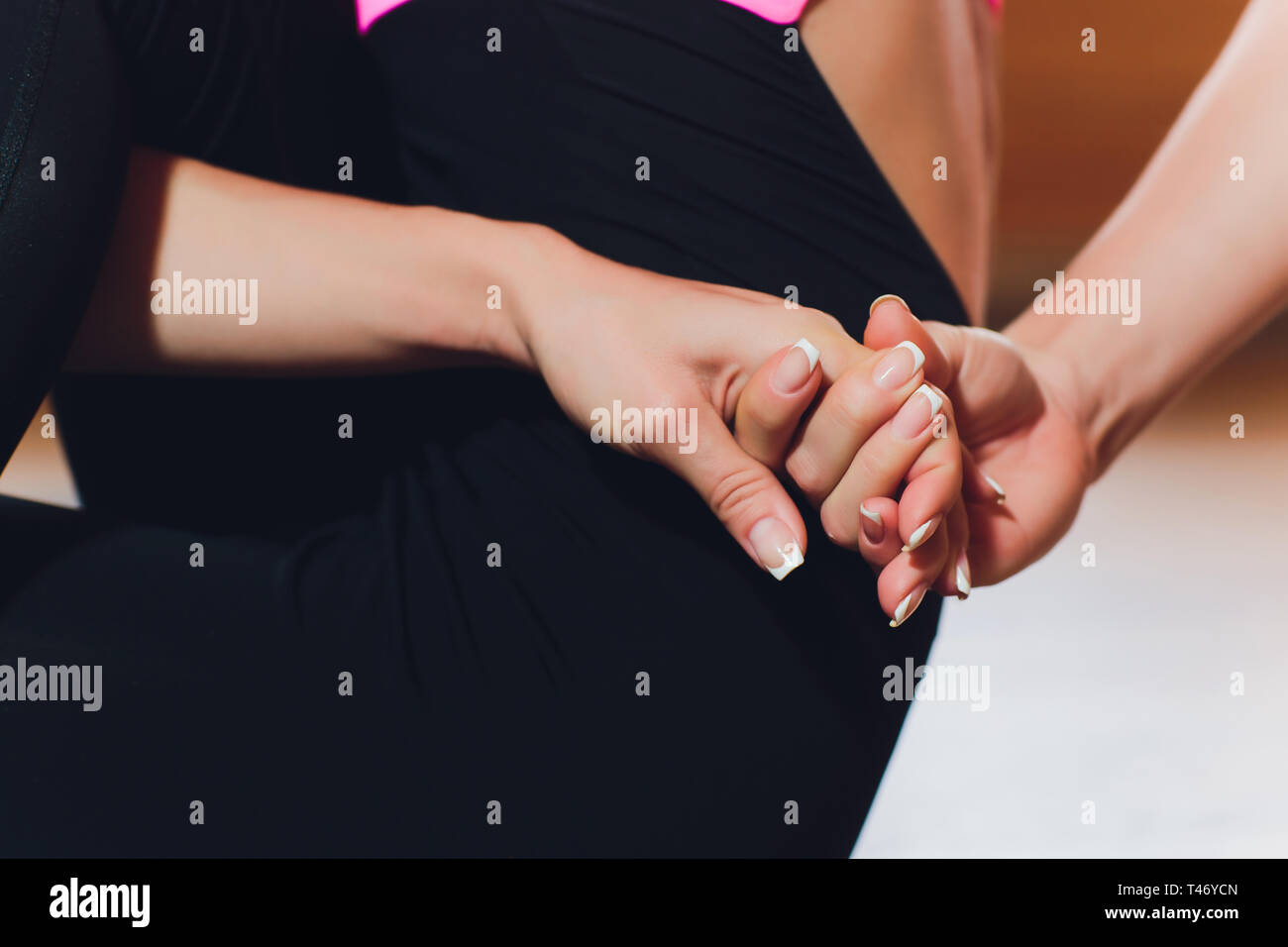 Woman bending forward hands on hi-res stock photography and images - Alamy