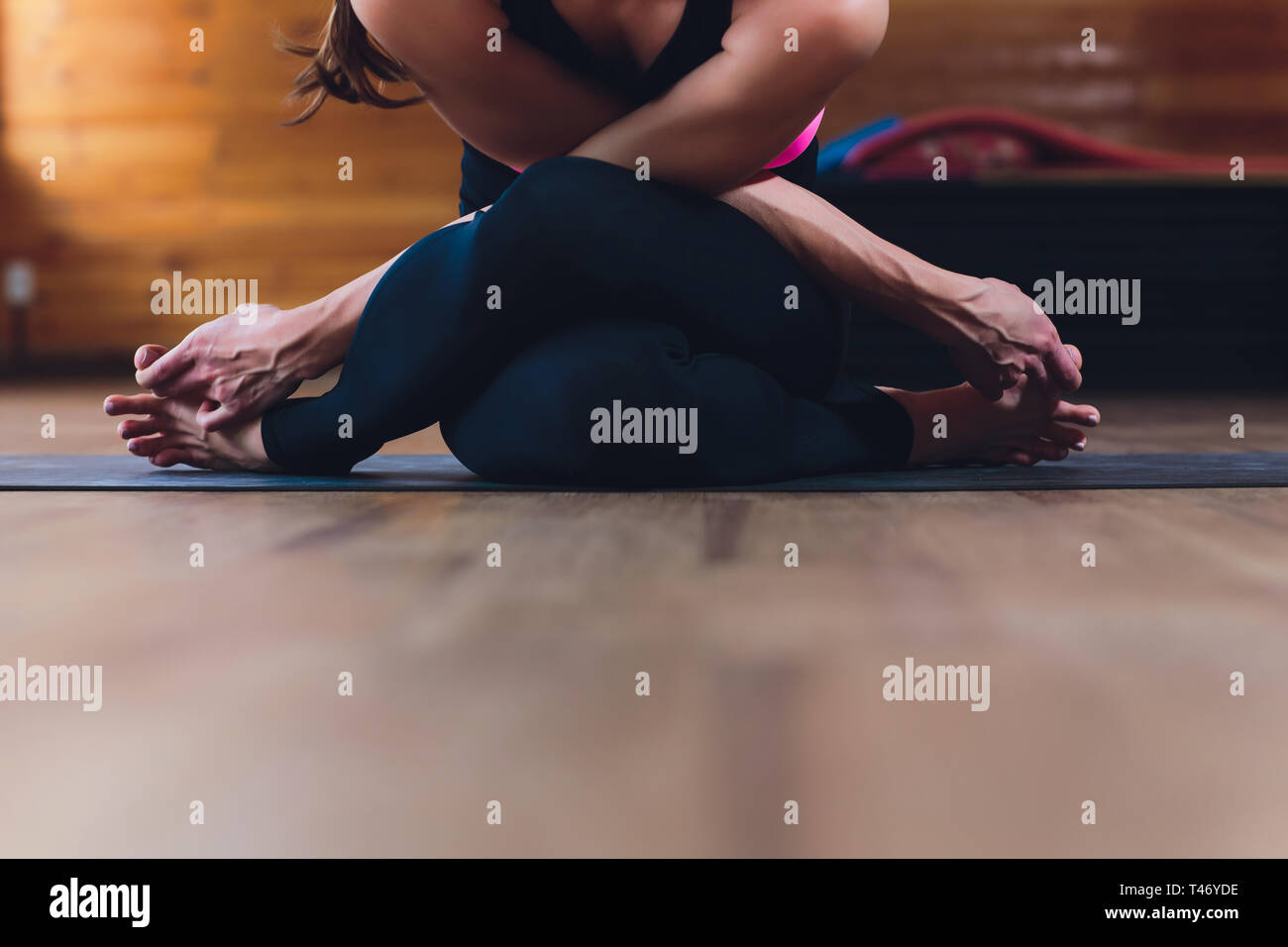 Yoga pose forward bend feet hi-res stock photography and images - Alamy