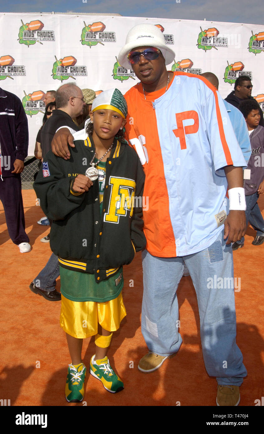LOS ANGELES, CA. April 12, 2003: Singer LIL ROMEO & father MASTER P. at ...