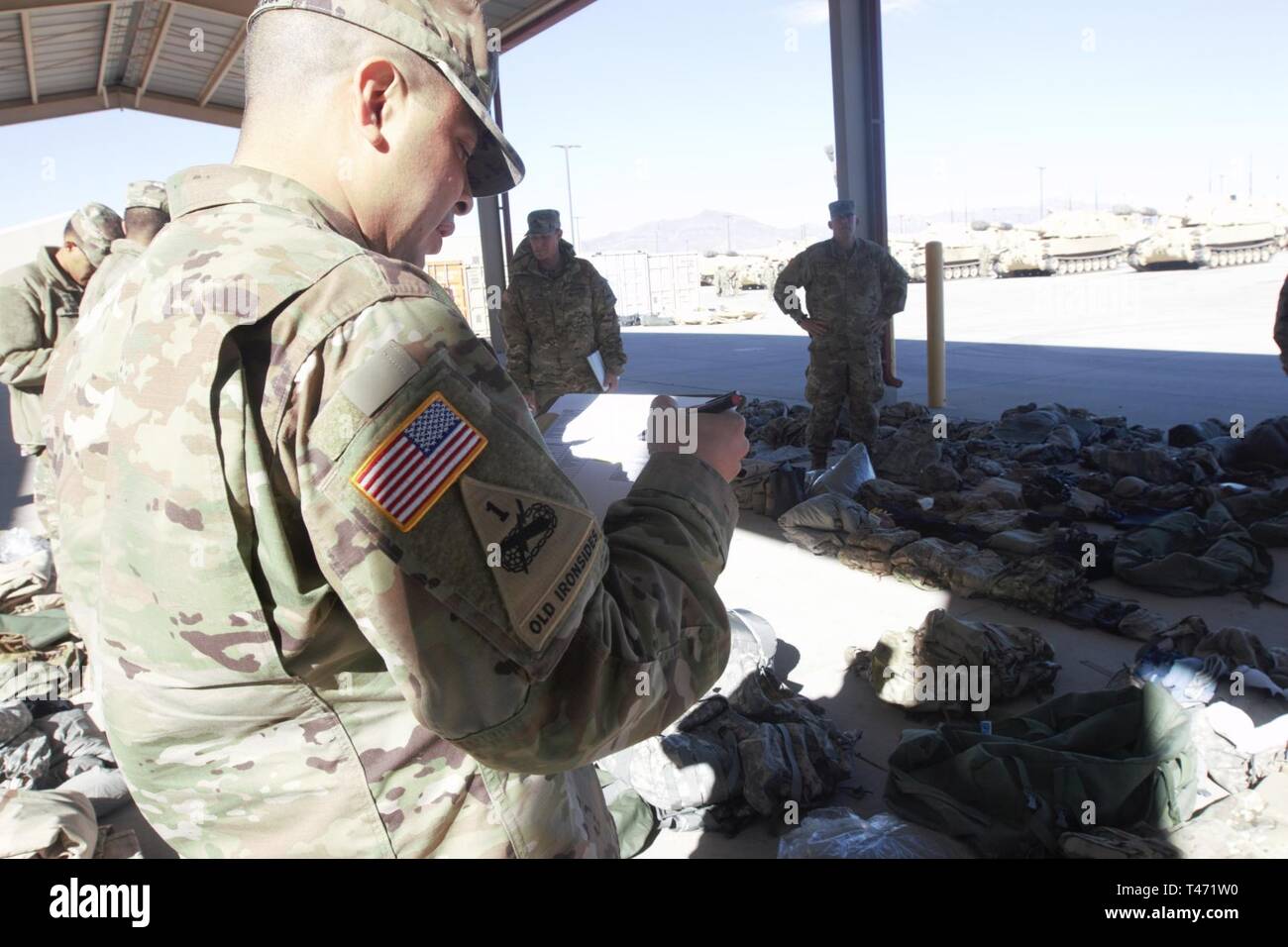 An Iron Soldier platoon sergeant calls out all items one-by-one that is ...