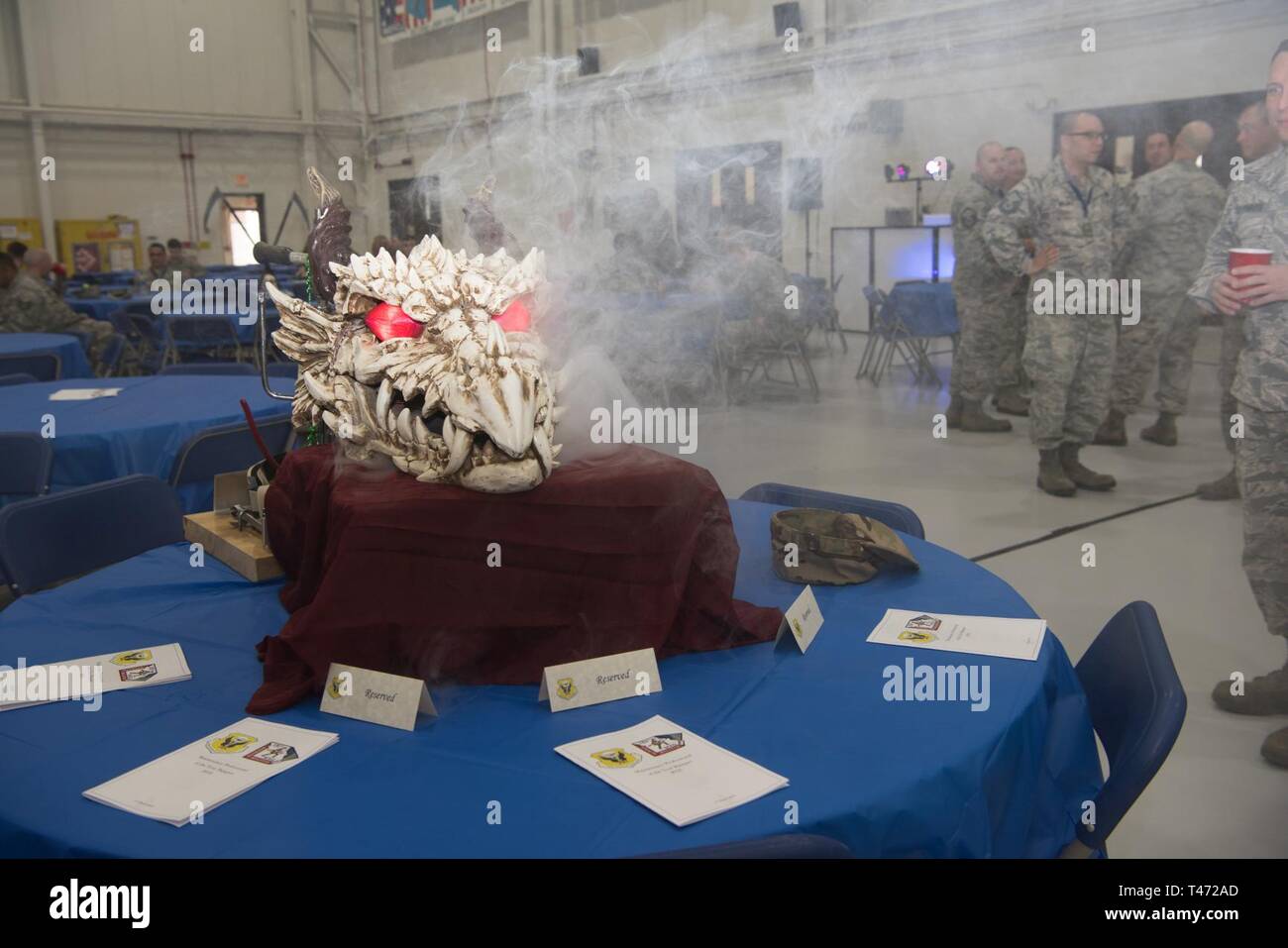The 509th Aircraft Maintenance Squadron table topper emits smoke during ...