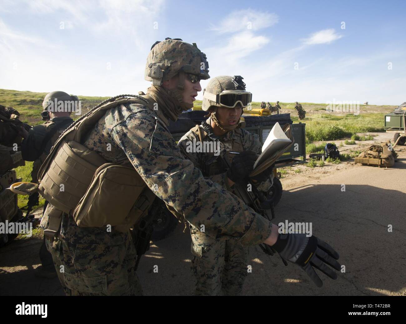 Gunnery Sgt. Troy Grassi and Lance Cpl. Jeco Ocay, with Marine Wing ...