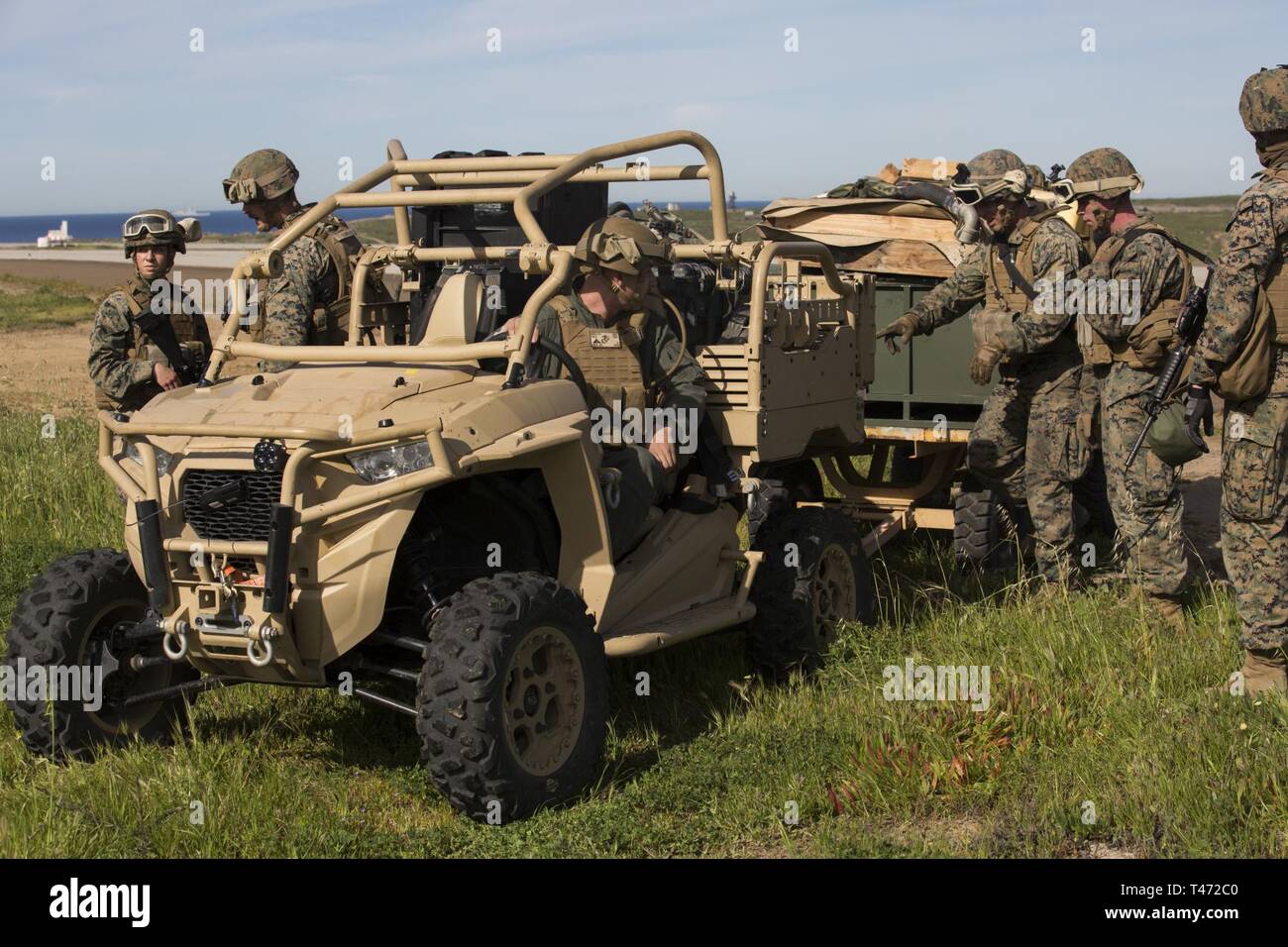 U.S. Marines with Marine Wing Support Squadron (MWSS) 371 use a Polaris ...