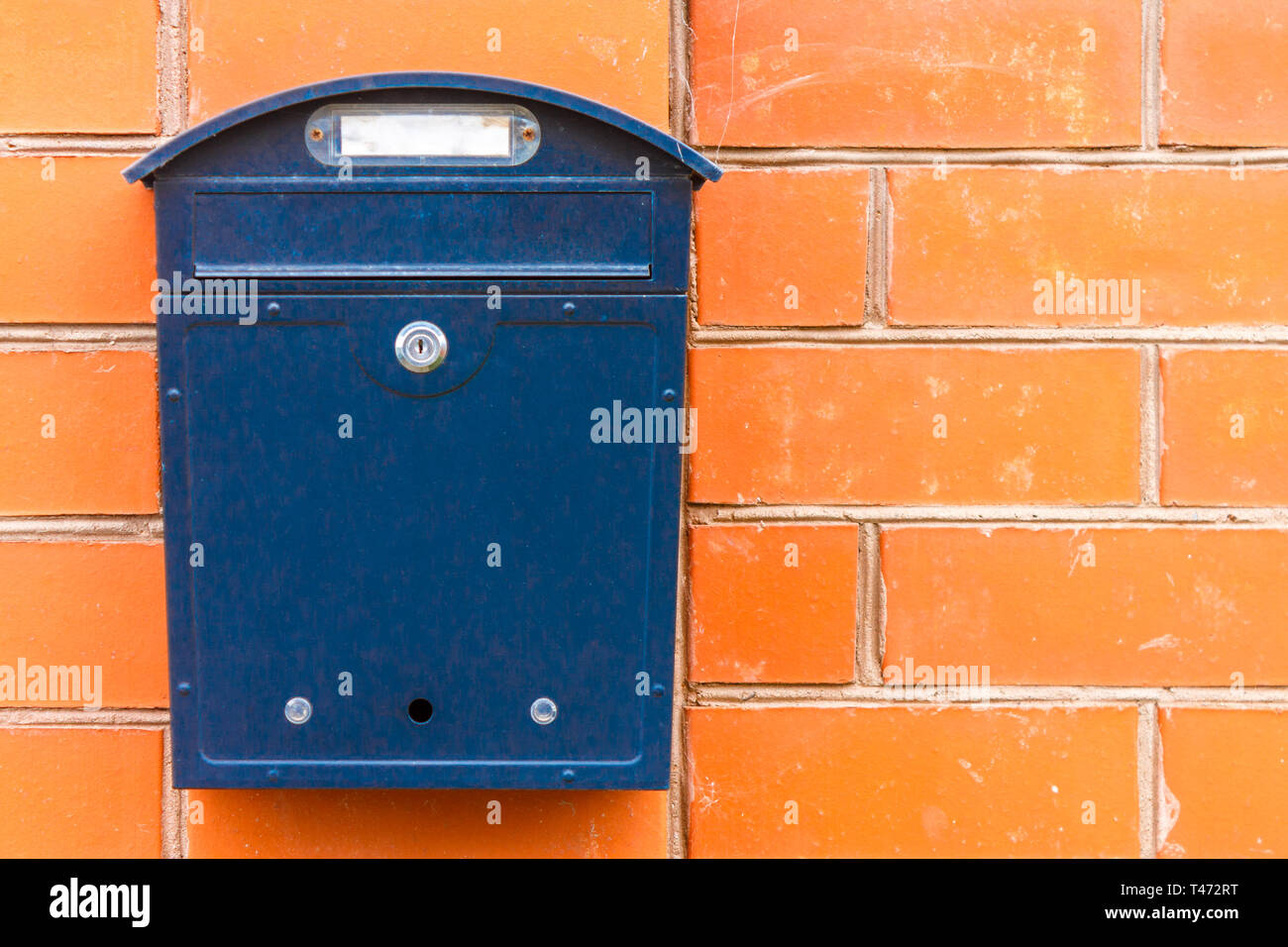 A beautiful mailbox hangs waiting for newspapers, parcels and letters ...