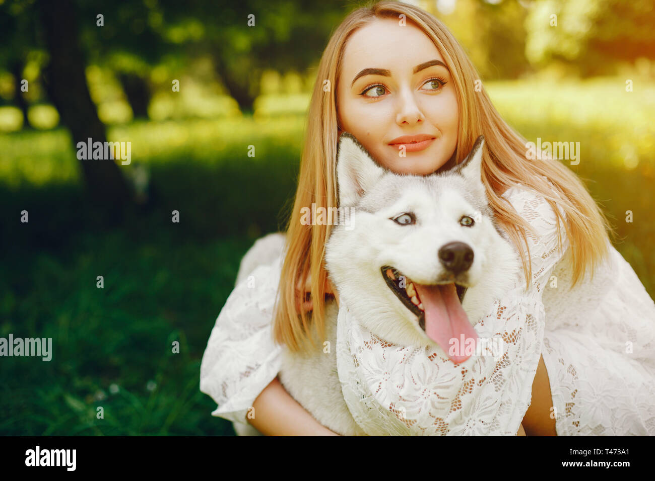 Elegant girl with dog hi-res stock photography and images - Alamy