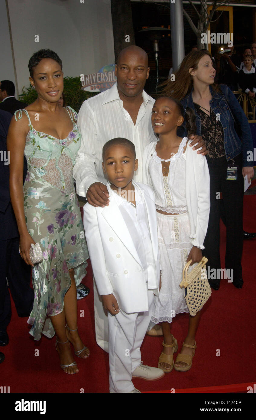 LOS ANGELES, CA. June 03, 2003: Director JOHN SINGLETON & family at the ...