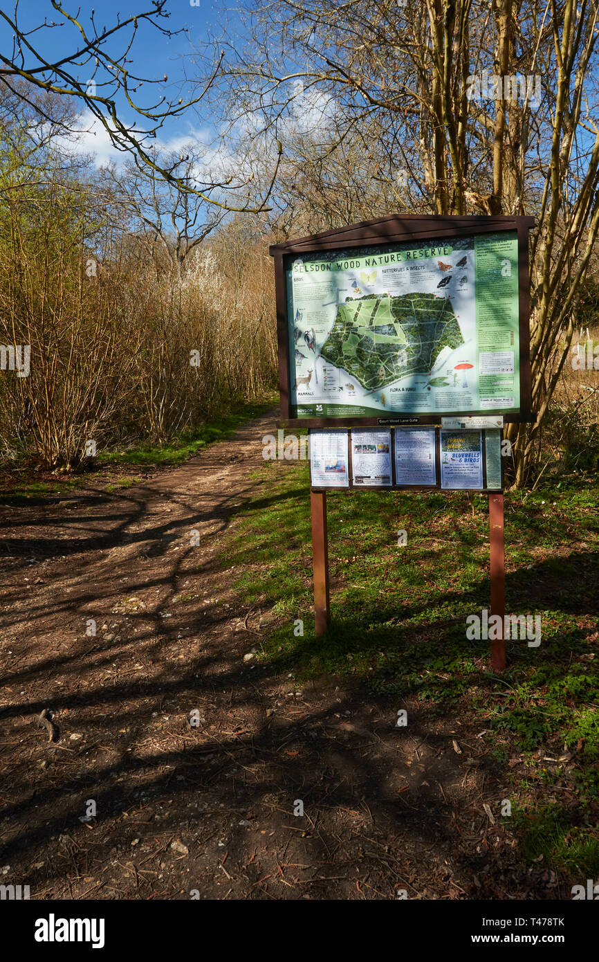 Map and sign along the woodland path in the spring sunshine, Selsdon ...