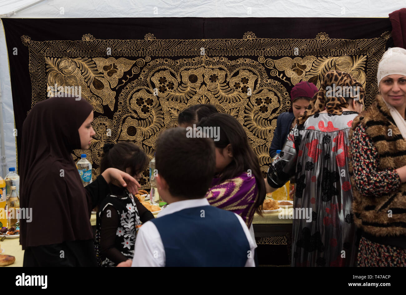 Tajiks in their national interior during the Nowruz celebration in ...