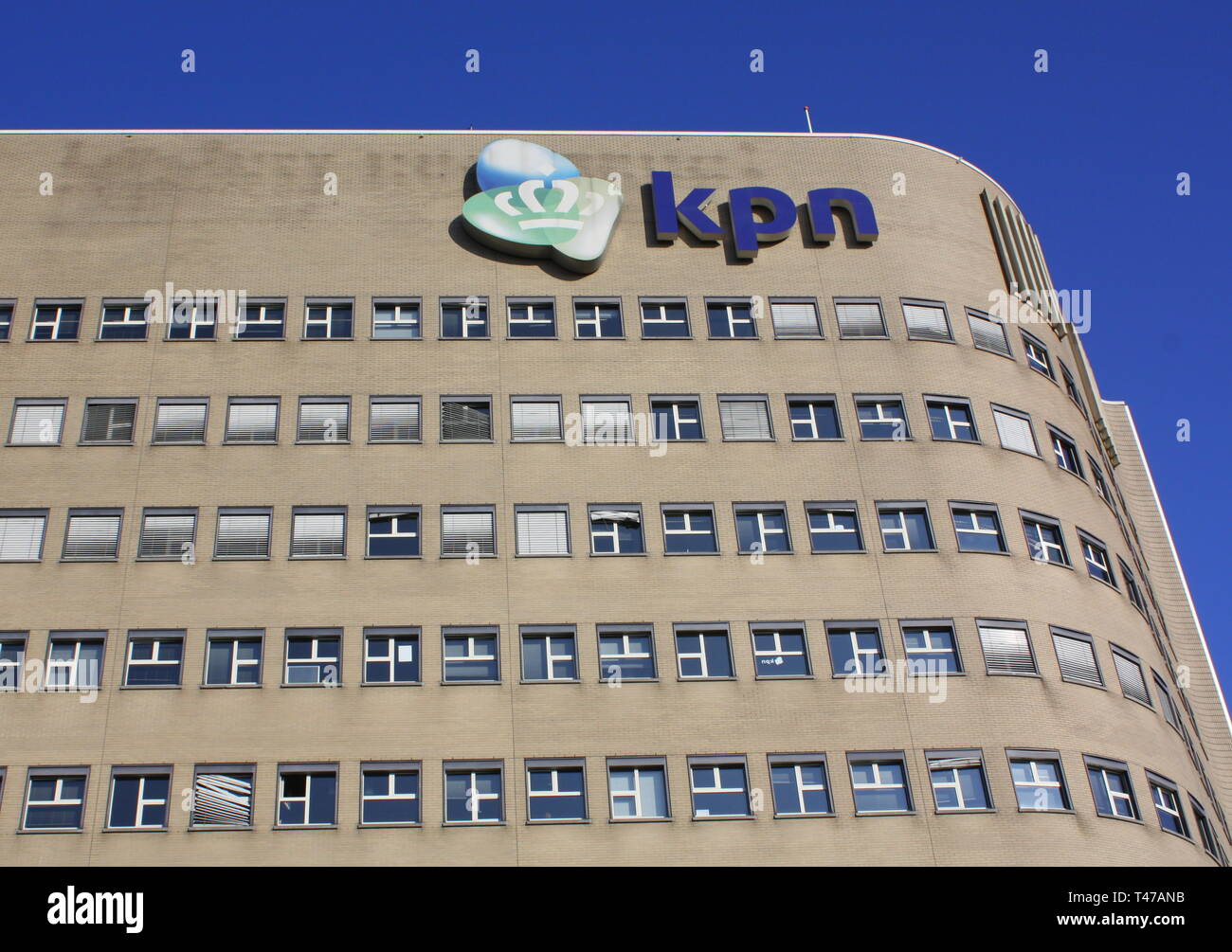 Martini tower from the 15th century with dutch flags in the city of ...