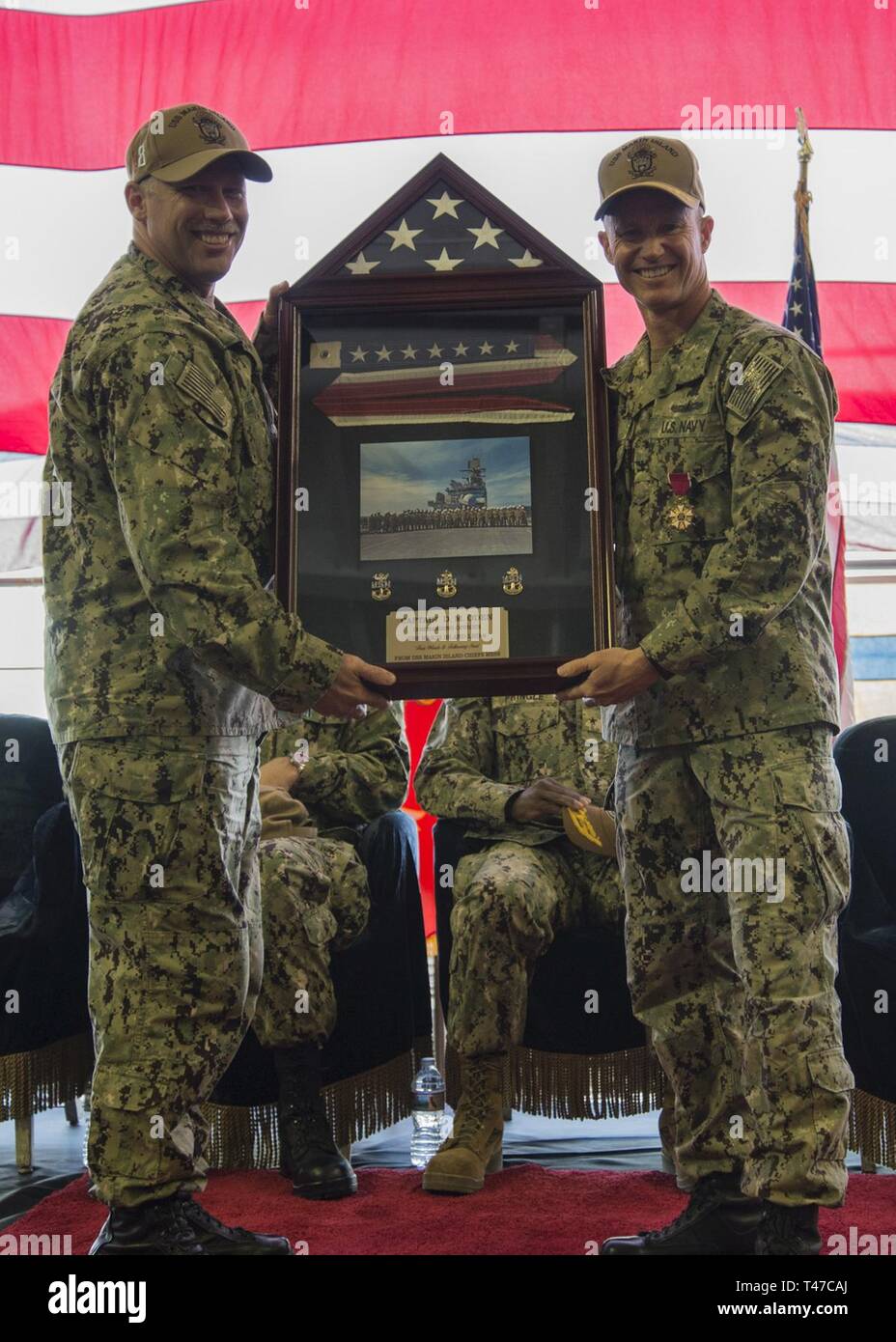 DIEGO (March 15, 2019) — Command Master Chief Neal Olds presents Capt ...