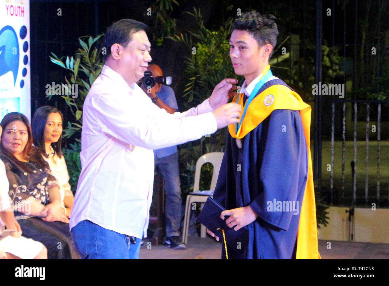Philippines. 08th Apr, 2019. Dr. Joseph Villafuerte (left) putting the ...