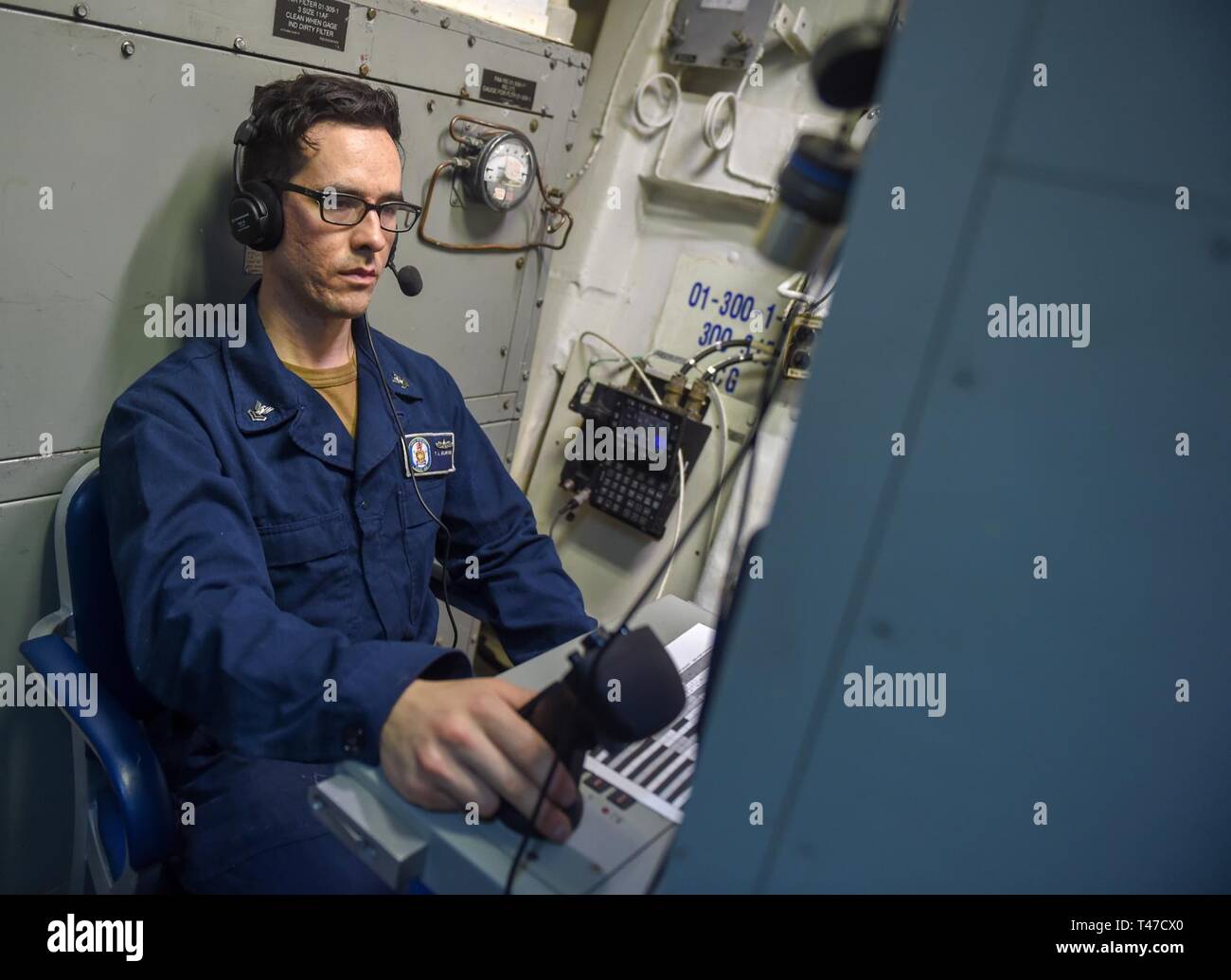 PHILIPPINE SEA (March 15, 2019) Fire Controlman 2nd Class Tyler Elmore ...