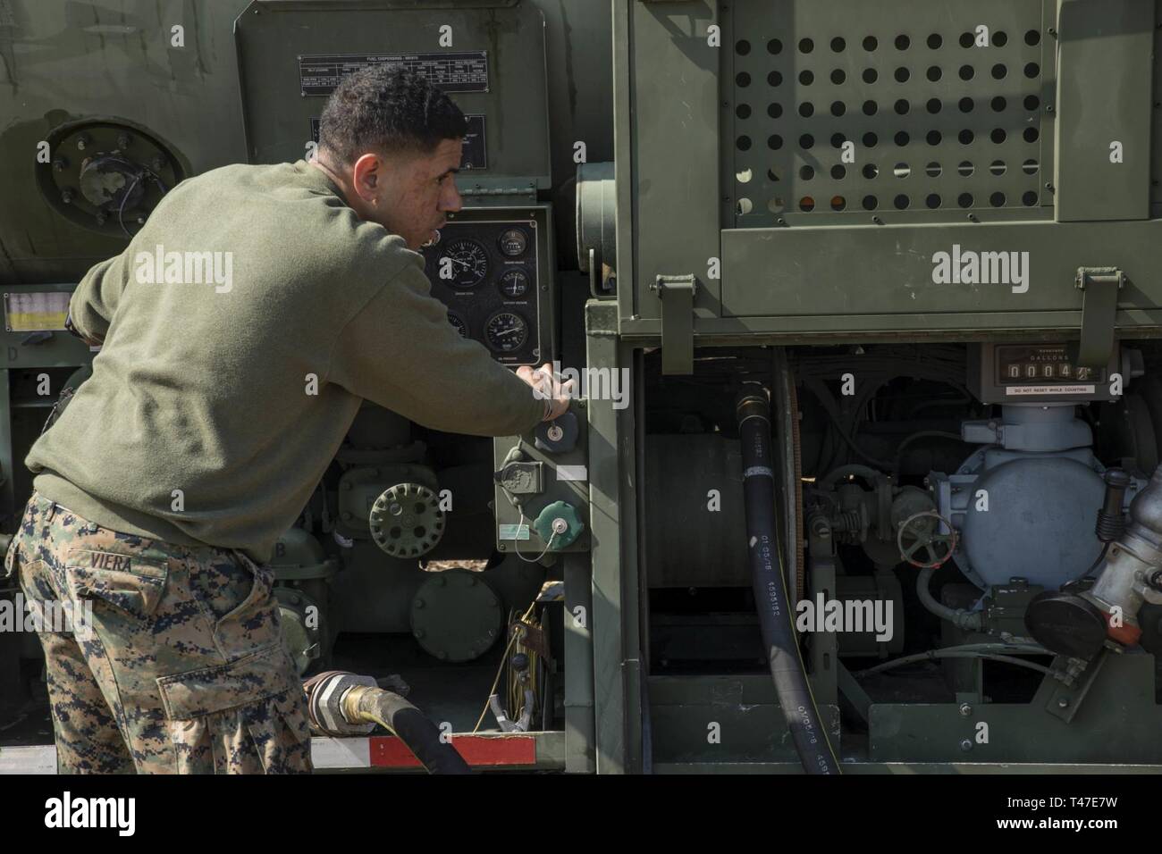 U.S. Marine Cpl. Steve Viera, a Motor Transport Refueler with Marine ...