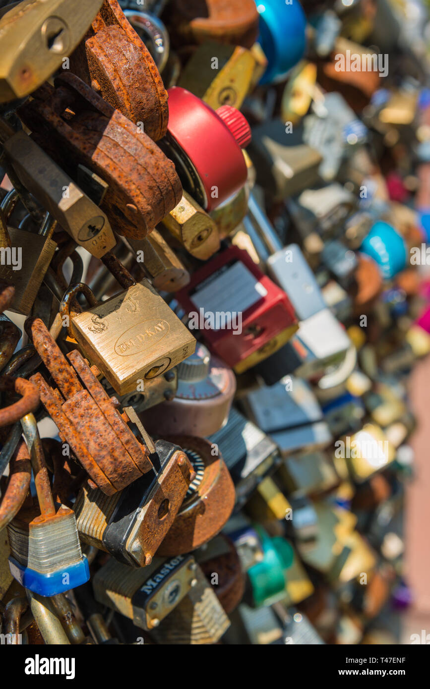 Attaching love locks hi-res stock photography and images - Alamy