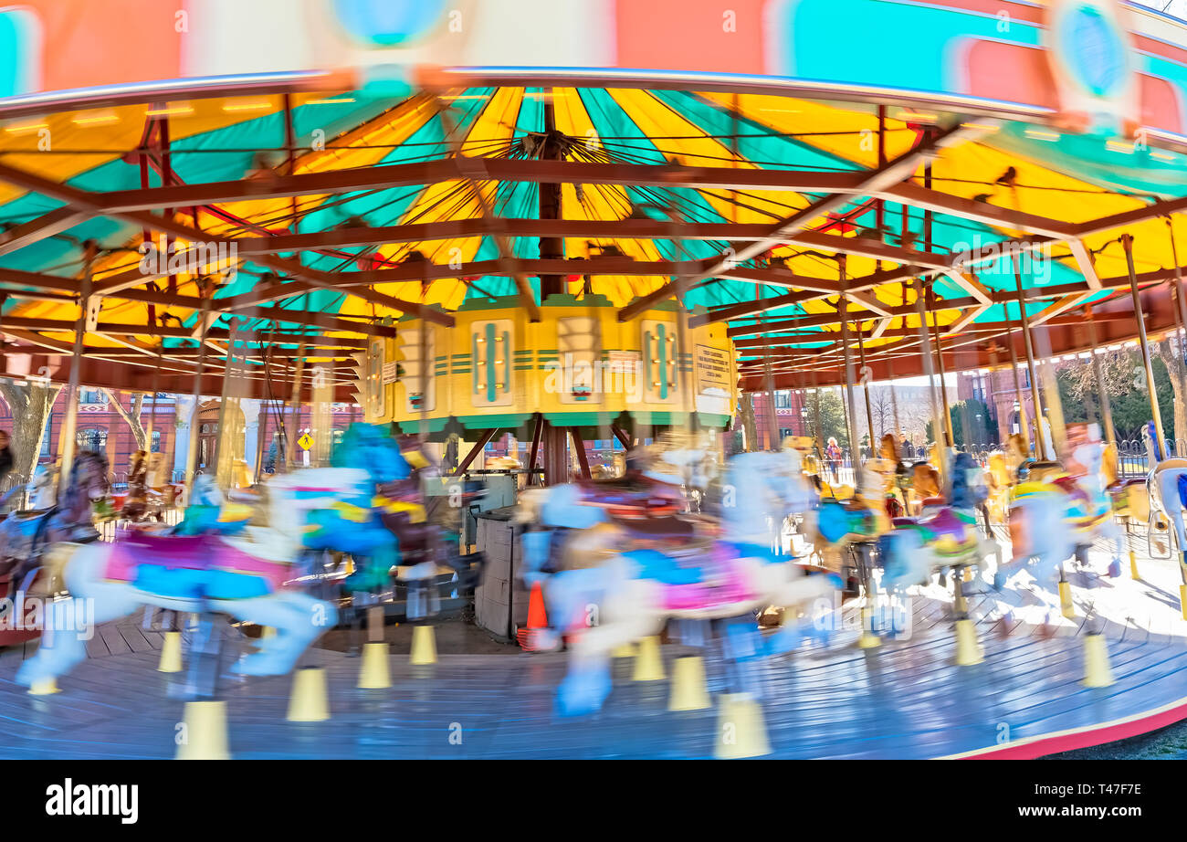 Colorful carousel in rotation in Washington DC public park Stock Photo ...