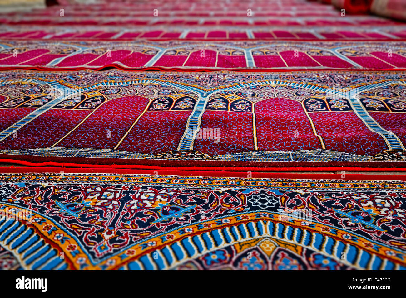 Mosque prayer carpets Stock Photo - Alamy