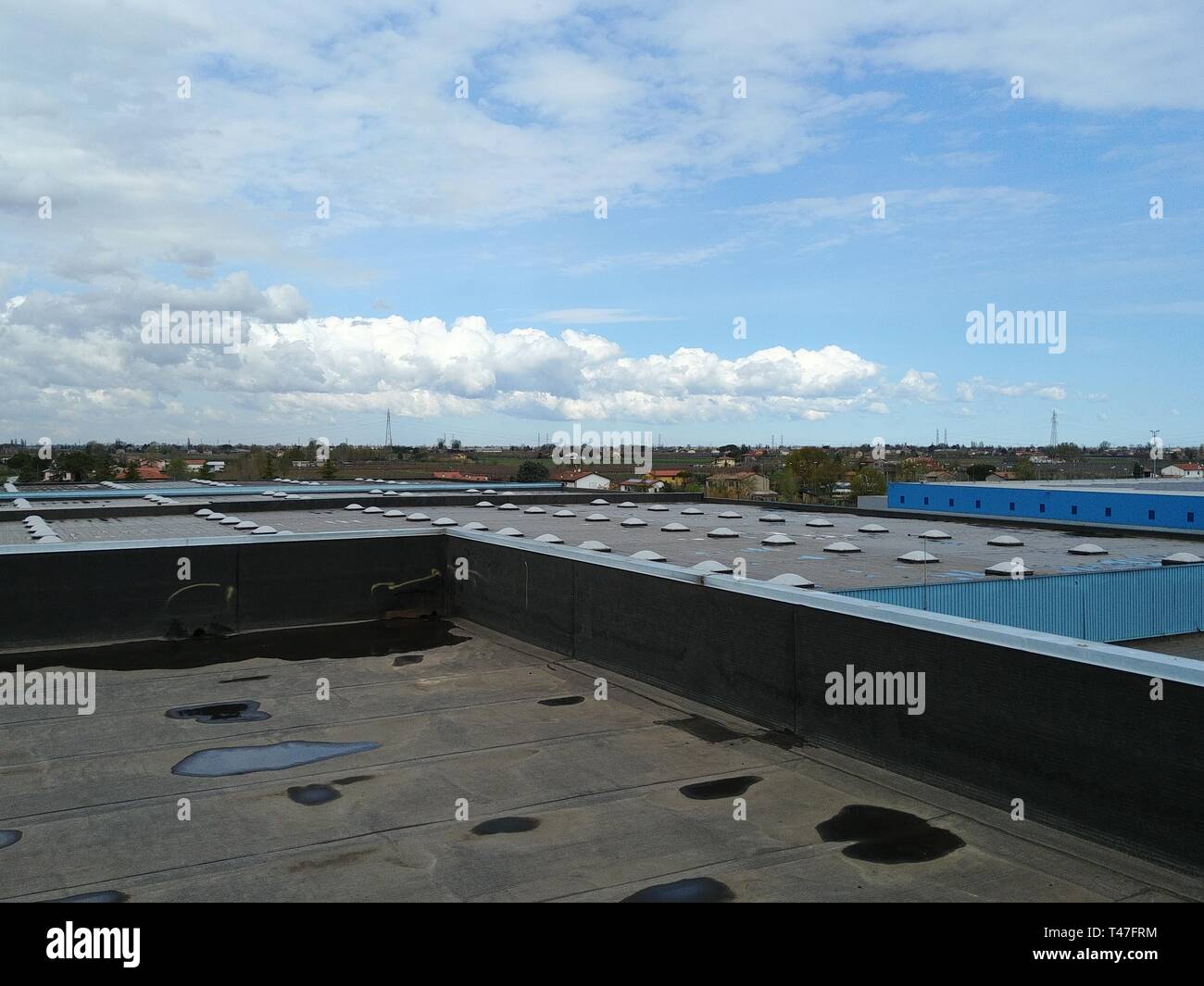 buildings roofs and sky Stock Photo - Alamy