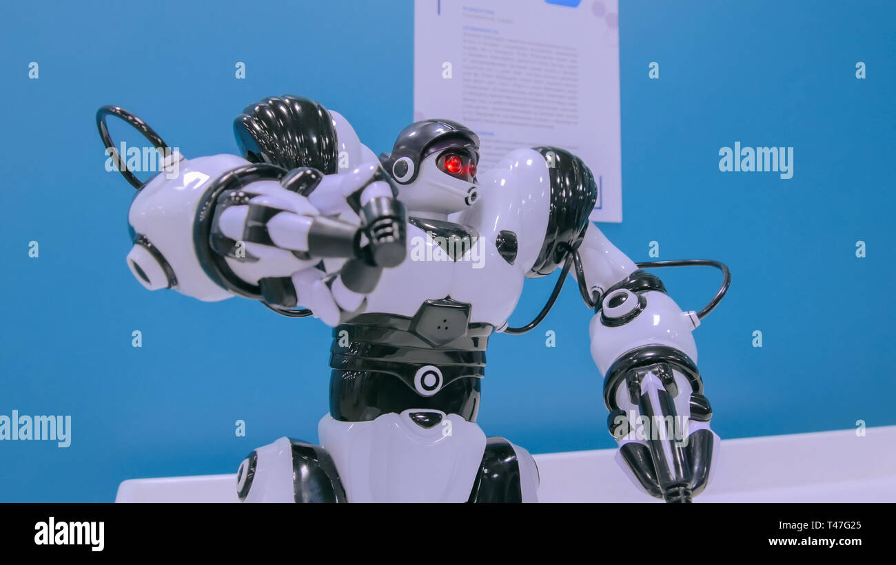 White humanoid robot dancing Stock Photo - Alamy