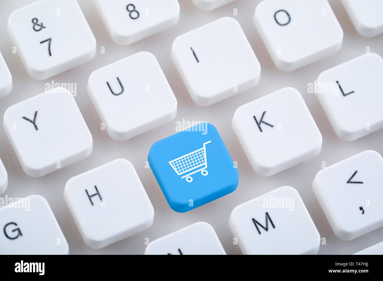Computer keyboard with shopping cart button. Online shopping concept ...