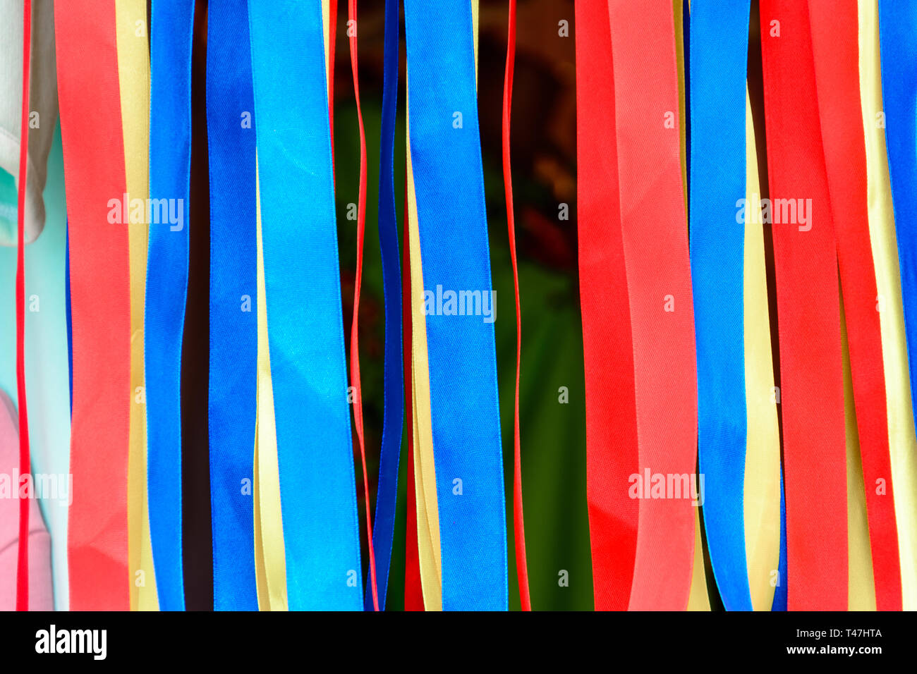 Variety of satin ribbons in different colors and lengths. 2019 Stock ...