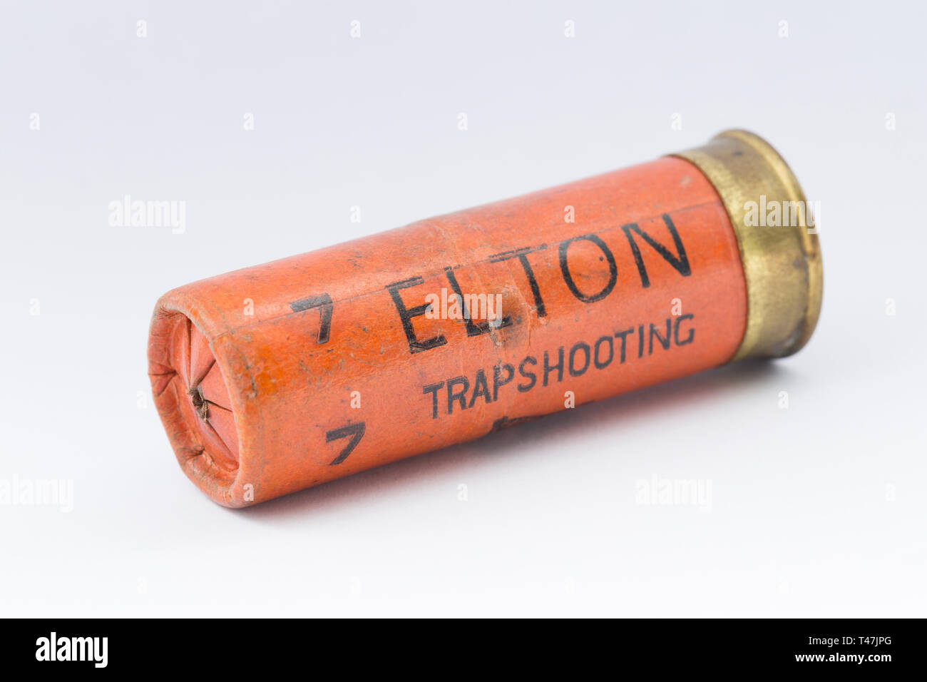 An Elton paper case 12 gauge trapshooting cartridge loaded with No 7 ...