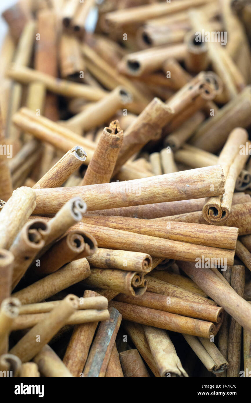 Cinnamon sticks background closeup Cooking food and aromatic condiment ...