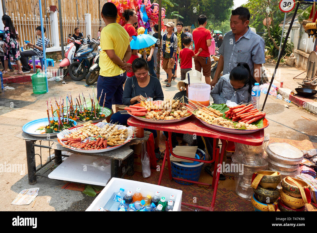 LUANG PRABANG, LAOS - APRIL 14, 2019. Local Lao people celebrating Pi ...