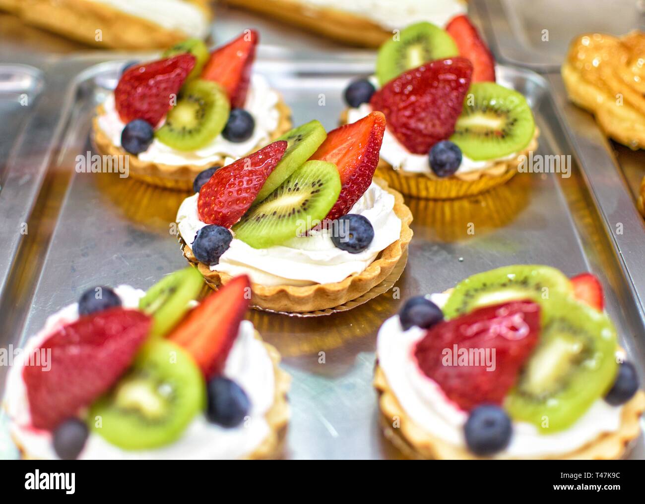 Tipical and delicious spanish pastry display case on a coffee shop ...