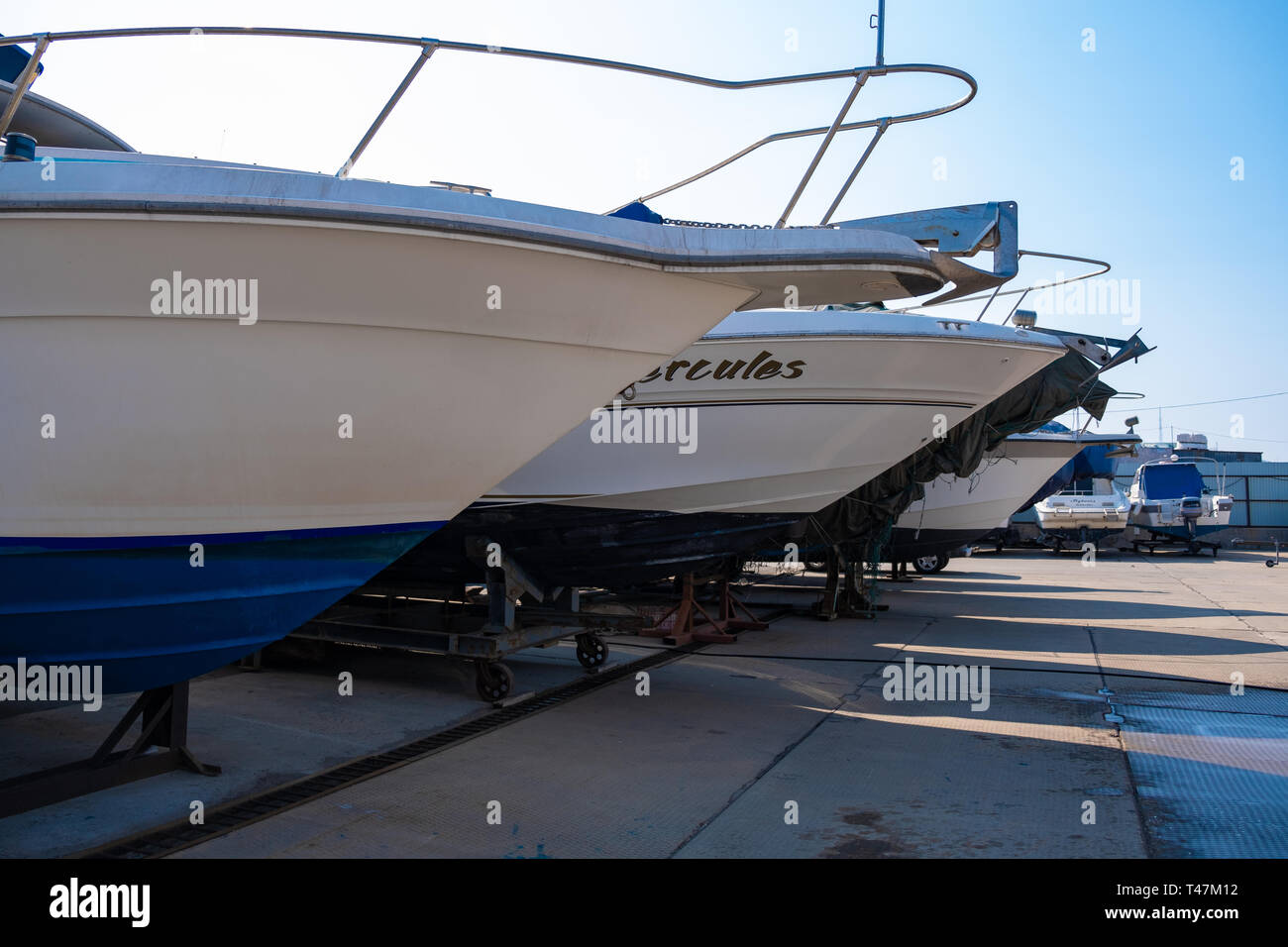 Boats are on the boat station on the pavement Stock Photo - Alamy
