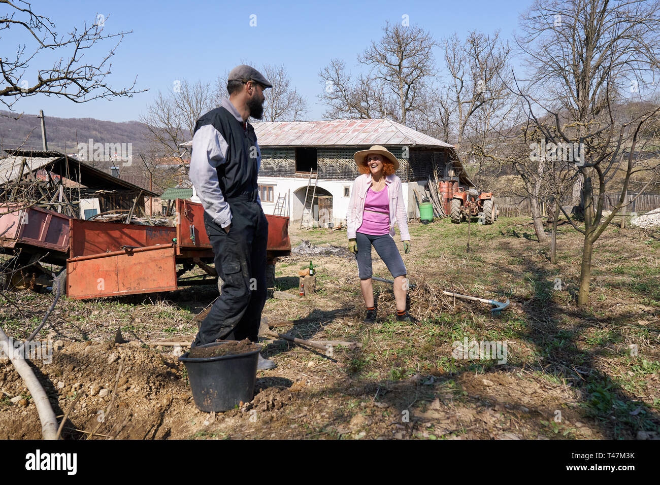 Farmers having a chat and a break from work Stock Photo - Alamy