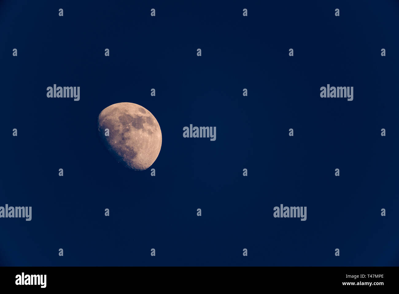 A three quarter moon photographed in the northern hemisphere Stock ...