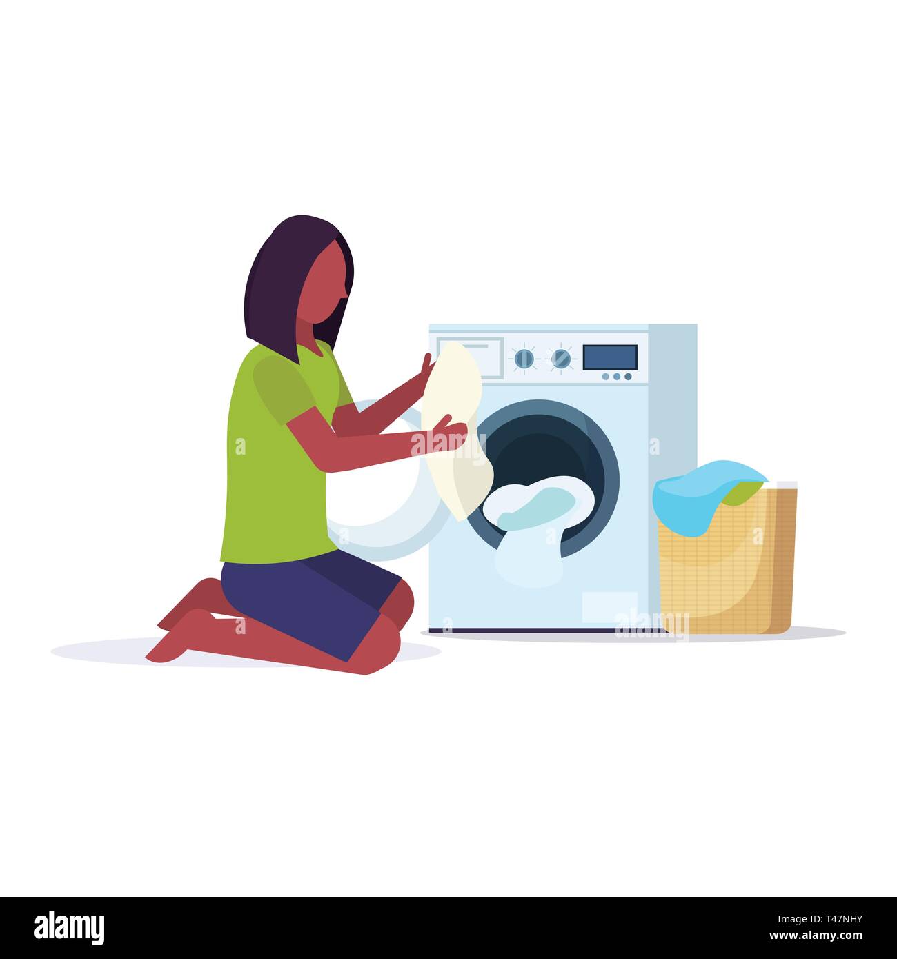 woman putting dirty clothes into washing machine african american ...