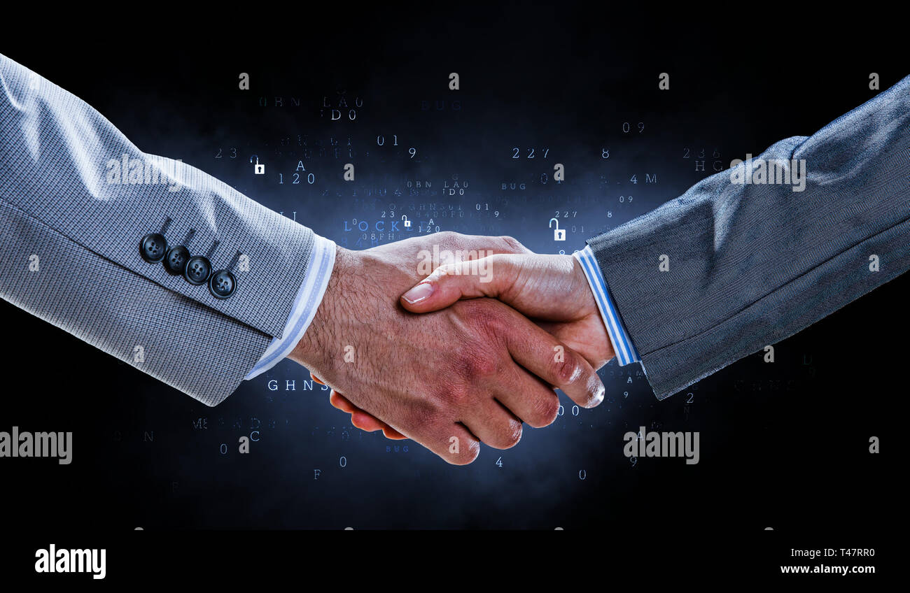 Business handshake by a man and a woman Stock Photo - Alamy