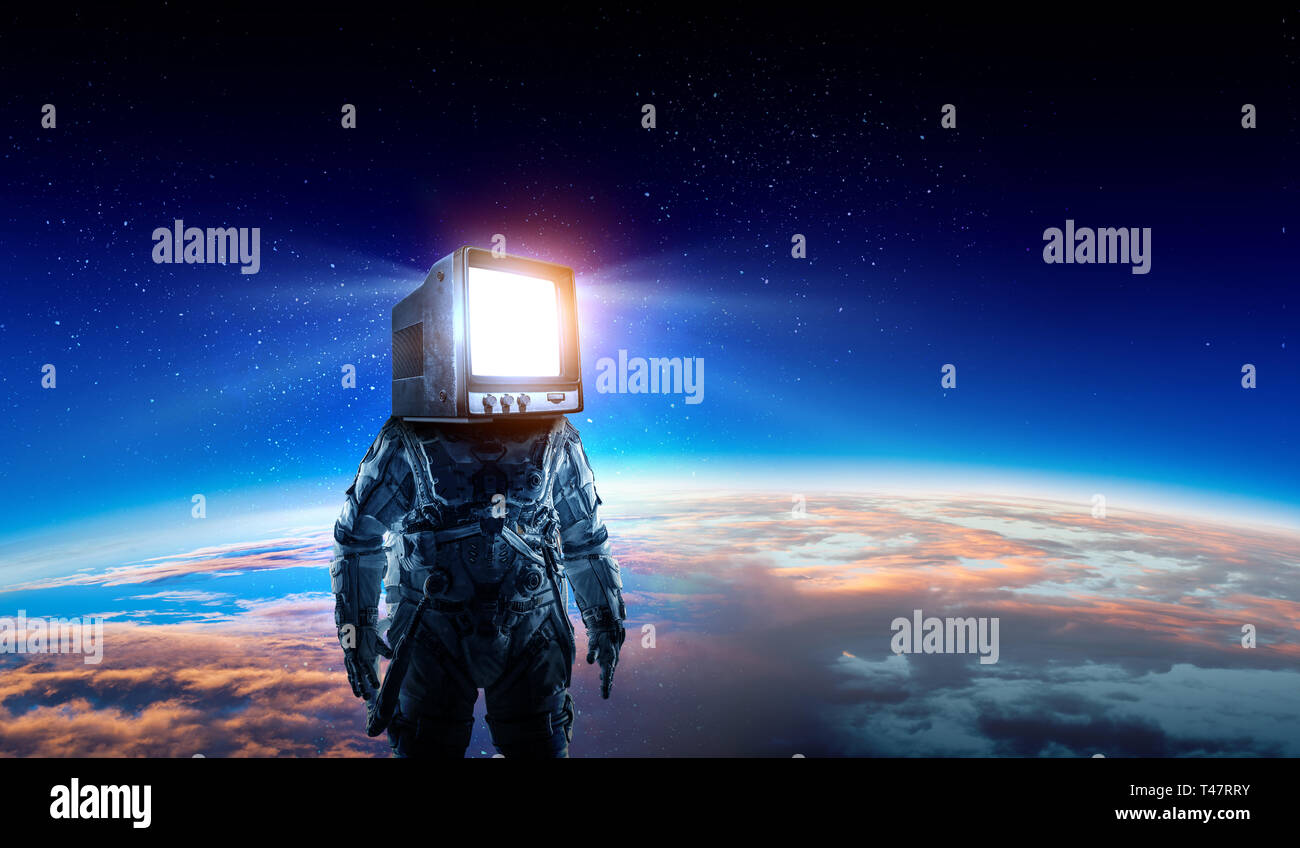Astronaut with TV head in space. Mixed media Stock Photo - Alamy